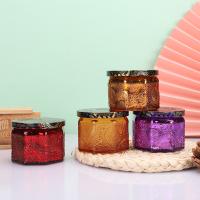 China Octagon Glass Embossed Candle Jars Empty Luxury Multi Color 4oz 8oz With Lid for sale