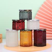 China Octagon Glass Embossed Candle Jars Empty Luxury Multi Color 4oz 8oz With Lid for sale