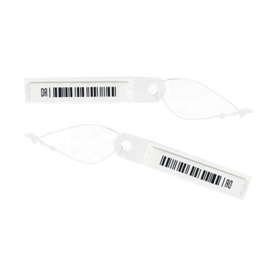 China AM 58KHz EAS Security Soft Label 60x11x2mm with String Bar Code for Jewelry Anti-Theft for sale