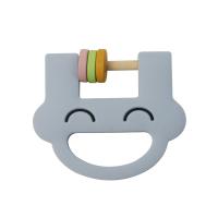 China Smile Face Cute Silicone Kids Toys Silicone Rattle Teether With Customize Logo OEM ODM for sale