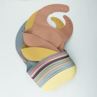 China 4 Buttons BPA Free Silicone Baby Bib Waterproof Soft Durable Adjustable for sale