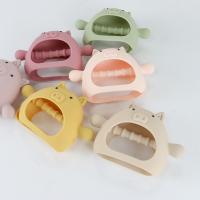 China Custom Various Shapes pig shape handle grip Silicone Teether for Baby with Various Designs for sale