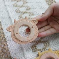 China Multifunctional Silicone Baby Teether With Attachable Teething Wooden Ring Animal Pattern for sale