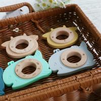 China BPA Free Silicone Baby Teether With Wooden Ring Teething Relief For Babies Durable for sale