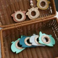 China BPA Free Silicone Baby Teether With Wooden Ring Teething Relief For Babies Durable for sale