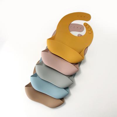 China Silicone Baby Bib Unisex OEM Lightweight Soft Flexible Waterproof Easy Clean Feeding Essential for Toddlers and Infants for sale