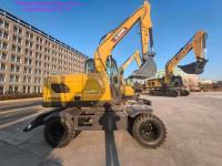 China High Efficiency 7 Ton Wheel Excavator with 0.23m³ Capacity and 48 kW Engine for Earth Moving for sale