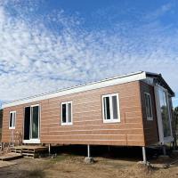 China Extended Bifold Folding Expandable Prefab House Flat Pack Container for sale