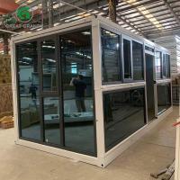 China Customized Glass Prefab Folding Container House Temporary Accommodation Resort for sale