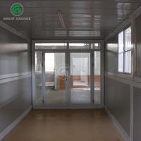 China Windproof And Warm 20ft Fold Out Container Homes Wood Grain Glass Manufacturer for sale