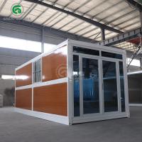 China Shockproof Fold Out Container Homes Wood Grain Glass Quick Setup for sale