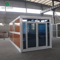 China Shockproof Fold Out Container Homes Wood Grain Glass Quick Setup for sale