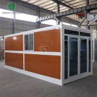 China Shockproof Fold Out Container Homes Wood Grain Glass Quick Setup for sale