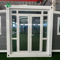 China 40ft Expandable Container Shelter White Frame Gray Wall Panel Broken Bridge Aluminum Door for sale