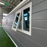 China 40ft Expandable Container Shelter White Frame Gray Wall Panel Broken Bridge Aluminum Door for sale