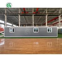 China 40ft Expandable Container Shelter White Frame Gray Wall Panel Broken Bridge Aluminum Door for sale