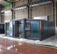 China 20FT Expandable Container Home Design Black Frame Black Wall Panel EPS Tempered Glass Door for sale