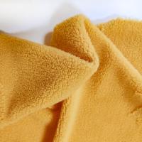 China Warp Knitted Sherpa Fleece Fabric 100% Polyester Yellow Jacquard For Garment for sale