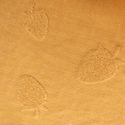 China Warp Knitted Sherpa Fleece Fabric 100% Polyester Yellow Jacquard For Garment for sale