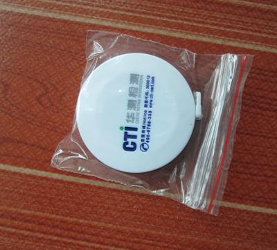 China Cheap round shape roller tape measure with custom logo for sale