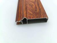 China Aluminum hollow profiles in the 6000 series, available with wood-grained anodized finishes, as well as bending and cutting services. for sale