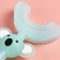 China 360 Manual Baby Silicone Teether Toothbrush Eco Friendly Bear Shaped for sale