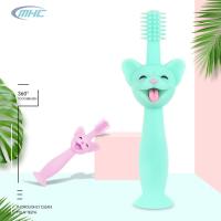China Silicone Infant Teething Toys Toothbrush Food Grade Pig Head Shape for sale