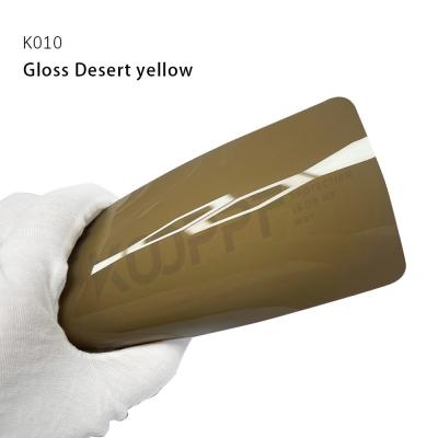 China 8.0 Mil K010 Gloss Desert Yellow Car Paint Protection Film For Changing Car Body Paint Color for sale
