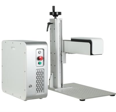China Automatic Lifting 3D Dynamic Focusing 30W Fiber Laser Engraver for sale