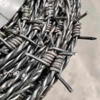 China 50kg Galvanized Razor Barbed Wire Mesh Stainless Steel Barb Wire Fence Roll for sale