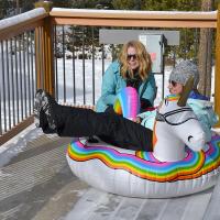 China Outdoor ski circle unicorn PVC inflatable ski board, cold-proof and durable PVC material outdoor sports inflatable toy for sale