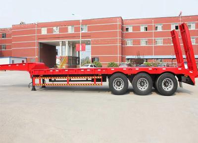 China High Strength 3 Axle Low Bed Trailer 70 To100 Tons For Self Dumping for sale