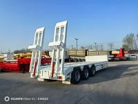 China 7 Axle Semi Trailer Self Dumping Truck Lowbed Trailer With 28 Tires for sale