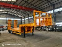 China 7 Axle Semi Trailer Self Dumping Truck Lowbed Trailer With 28 Tires for sale