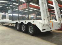 China 7 Axle Semi Trailer Self Dumping Truck Lowbed Trailer With 28 Tires for sale