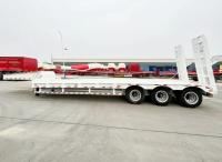 China Jost Kingpin 80t 3 Axle Low Bed Trailer For Smooth And Safe Crane Machine Transport for sale