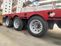 China Efficent 3 Axles Heavy Duty 60/80/100 Ton Low Bed Trailer Low Bed Tractor Trailer for sale