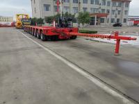 China 200t Load Capacity Widened Low-Flat Hydraulic Ladder Semi-Trailer for Transportation for sale