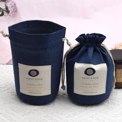 China Custom Logo Dark Blue Round Bottom Jute Drawstring Bag 10x20cm Candle Packing for sale