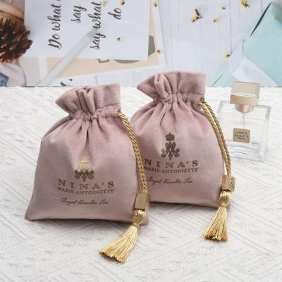 China Custom Velvet Perfume Drawstring Bag 20x15cm Pink with Gold Logo Tassel Packing for sale