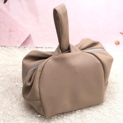 China Custom Logo PU Leather Zipper Cosmetic Travel Bag 30x20cm for Makeup Skincare Storage for sale