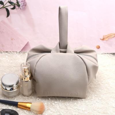 China Custom Emboss Leather Handle Cosmetic Zipper Bag 8x10 Inch Travel Wash Makeup Pouch for sale