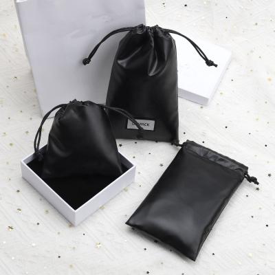 China Sunglasses Storage Pu Leather Drawstring Bag Soft Waterproof Custom Logo Printed for sale