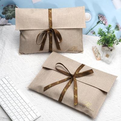 China Ribbon Luxury Envelope Jute Bag Dustproof Hair Packing with Satin Lining 30x40cm for sale