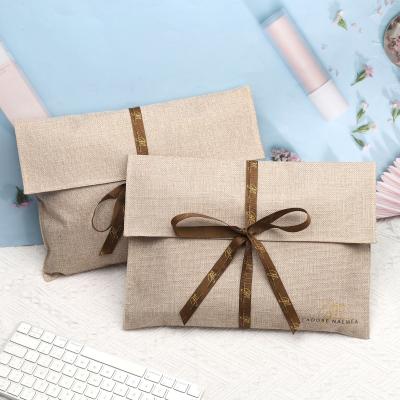 China 100 Natural Jute Envelope Dust Bag Custom Logo Reusable Gift Pouch 30x40cm for sale