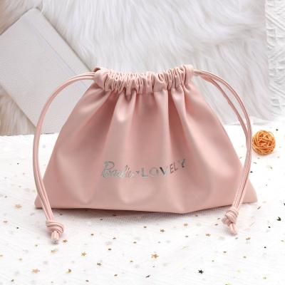 China Custom Logo PU Leather Drawstring Bag Waterproof Cosmetic Pouch 20x15 cm for sale