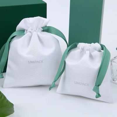 China Custom Logo Satin Drawstring Bag 4x6 Inch Reusable Jewelry Dust Pouch Travel Portable for sale