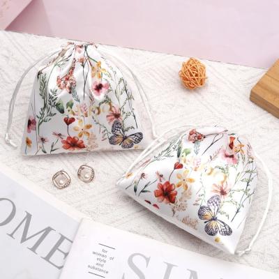China Custom Silk Satin Drawstring Pouch 10x10cm Full Screen Printed Dustproof Jewelry Bag for sale