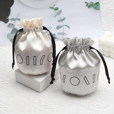 China Round Bottom Satin Gift Candle Packaging Bag Custom Printed Drawstring Pouch for sale