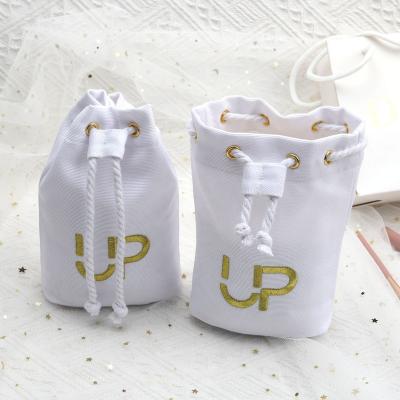 China Custom Embroidery Polyester Cotton Canvas Drawstring Pouch Round Bottom 4x6 Inch for Cosmetic Brush for sale